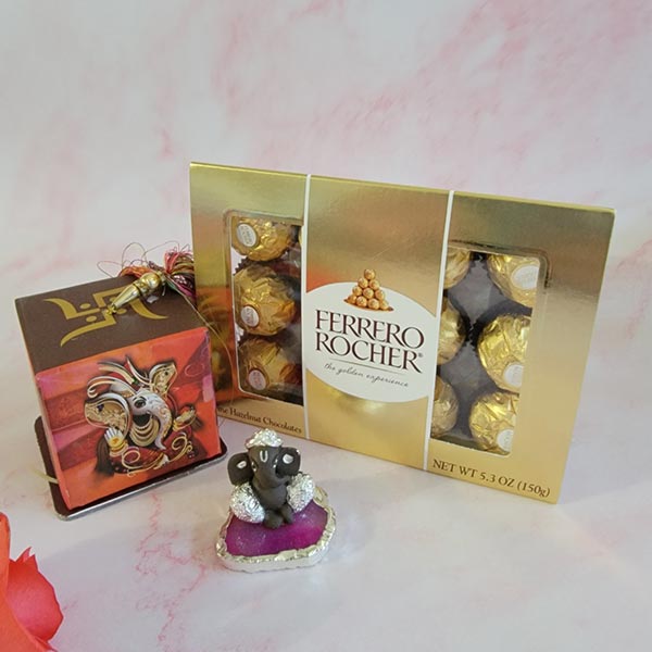 Send Black and silver ganpati with ferrero rochers Online - DW21-100248 ...
