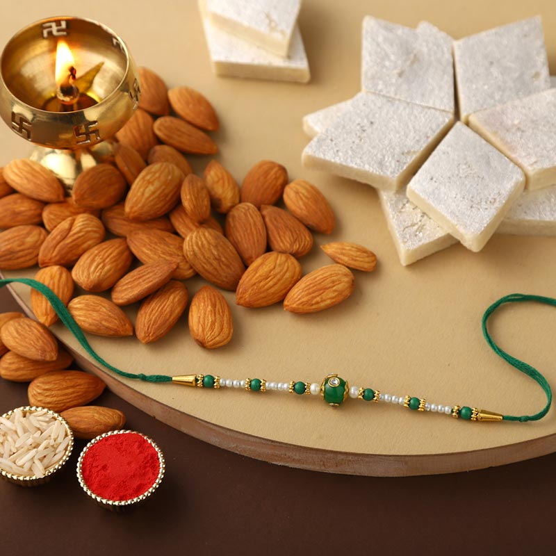 Send Sneh Fancy Green Rakhi with 250 Grams Kaju Katli and Almonds ...