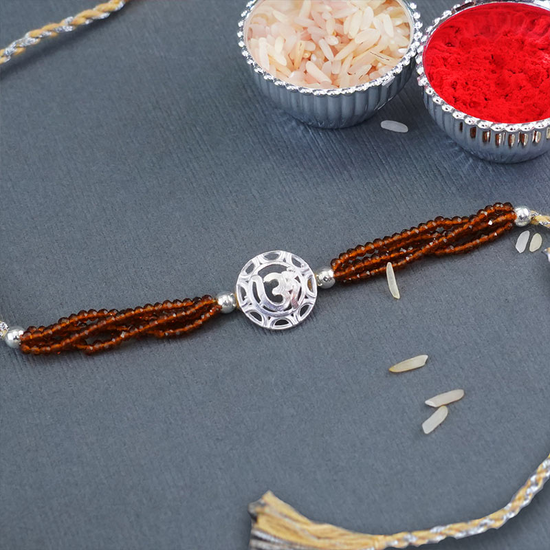 Send Stunning Silver Om Rakhi Online - RKH22-104986 | Giftalove